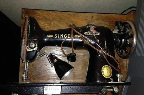 Ремонт машинки зингер. Машинка Зингер 1953. Швейная машинка Зингер с тумбой.