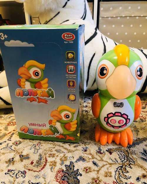 Игрушка говорящий попугай