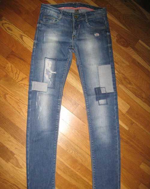 Узкие "рваные" джинсы