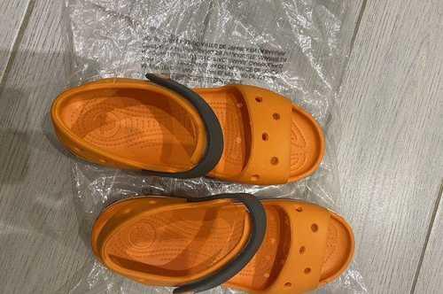 Новые сандалии crocs j3