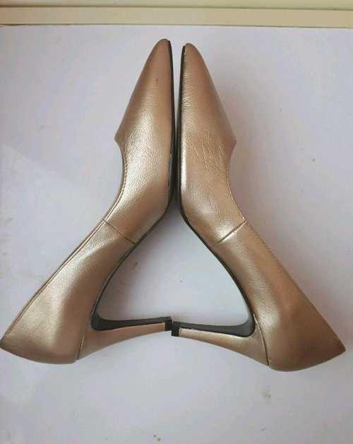 Новые кожаные туфли