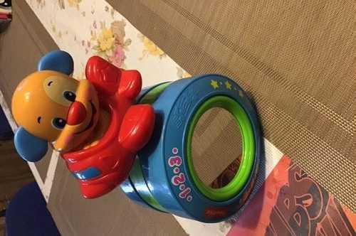 Музыкальная игрушка неваляшка Fisher Price самолет