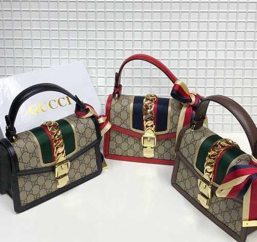 Сумка Gucci Sylvie Supreme GG Гуччи с лентой