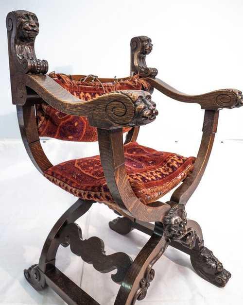 Антикварное курульное кресло с маскаронами