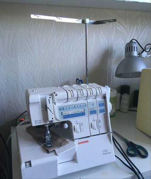 Коверлок Janome 1200D