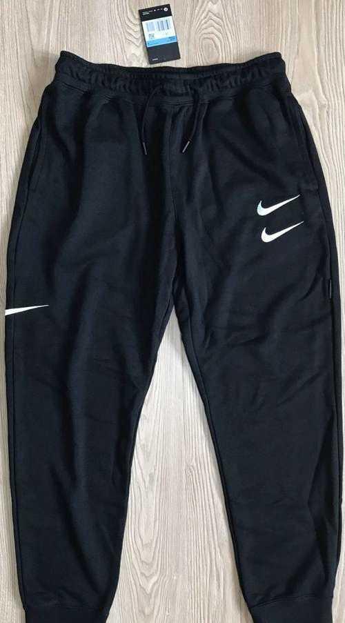 Новые брюки Nike Swoosh