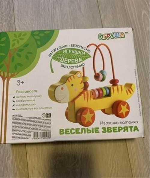 Деревянная игрушка-каталка