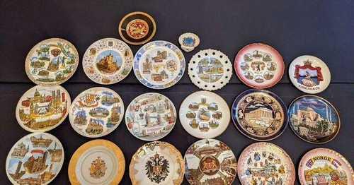 Сувенирные тарелки из разных стран и городов