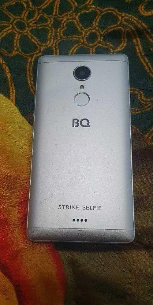 Телефон BQ selfie strike
