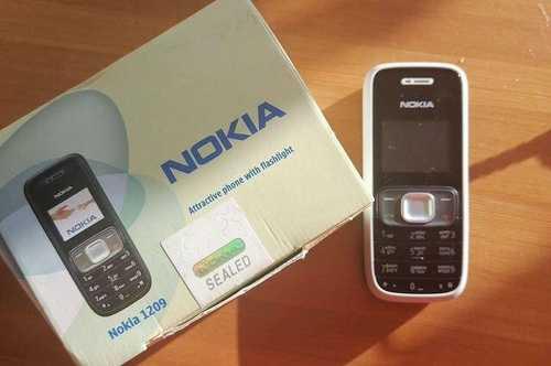 Новый Nokia 1209