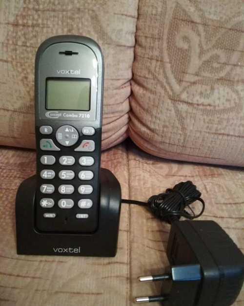 Радиотелефон без базы Voxtel новый зарядка адаптер