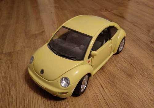 Модель авто VW new beetle 1:18 Burago