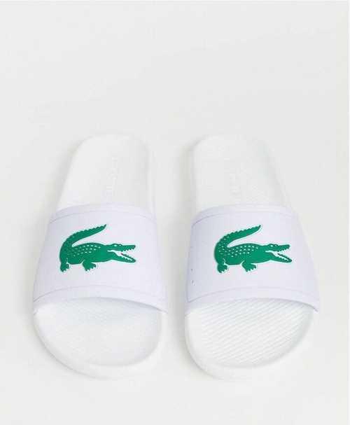 Белые шлёпанцы Lacoste