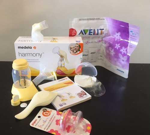 Молокоотсос ручной Medela Harmony с дополнением