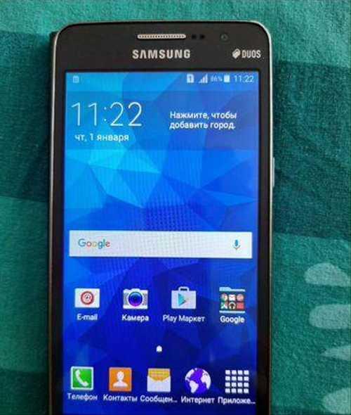 Телефон Samsung Grand Prime