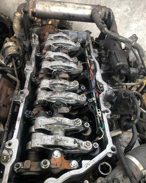 Isuzu 4hk1 вал коромысел б.у