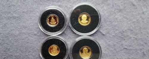 Золотоые монеты и настольные медали