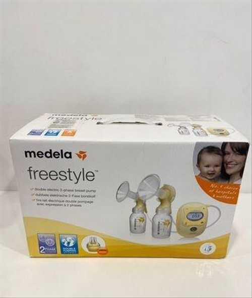 Молокоотсос двойной medela freestyle double новый