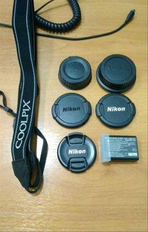 Крышки для объективов и аккумулятор для фотоаппара