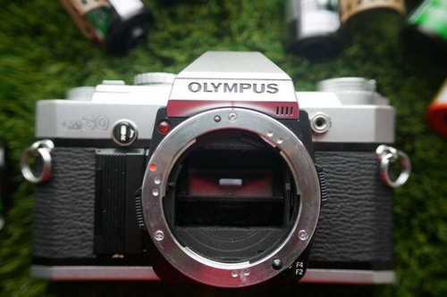 Olympus OM 30 продвинутая пленочная зеркалка