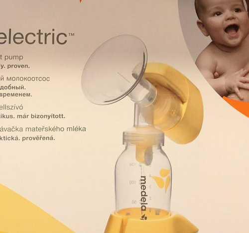 Молокоотсос medela электрический