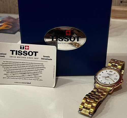 Золотые часы Tissot