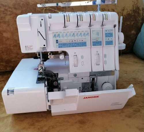 Коверлок Janome 1200d professional