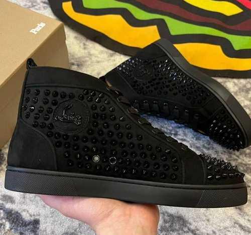 Кеды Christian Louboutin с шипами на руках