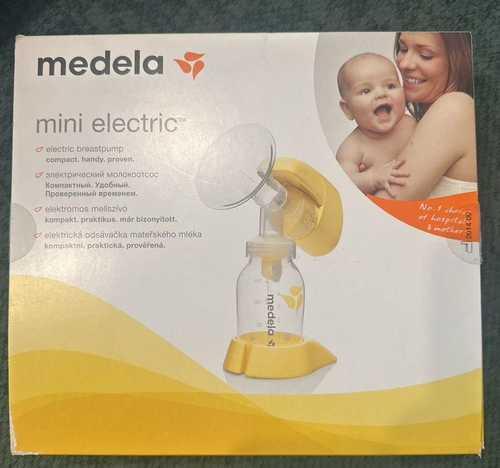 Молокоотсос medela электрический