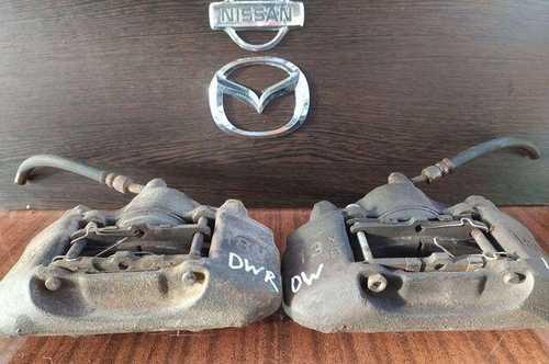 Суппорт передний Мазда Demio DW3W