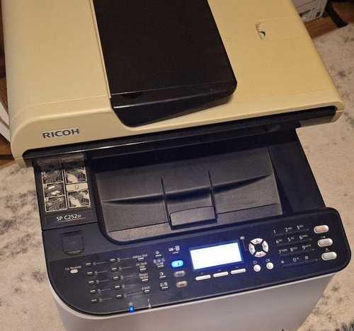 Мфу лазерный цветной ricoh sp c252sf