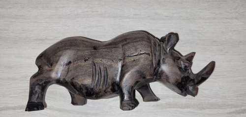 Резная фигура носорог