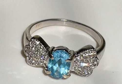 Золотое кольцо с бриллиантами и топазом