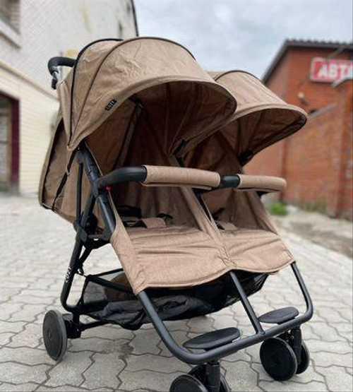 Прогулочная коляска для двойни Cozy Smart