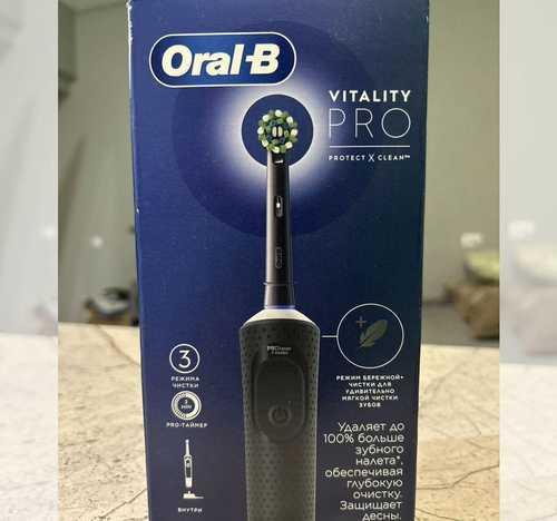 Электрическая зубная щетка oral b