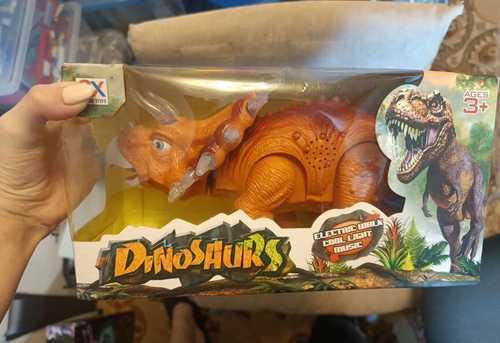 Игрушка Динозавр со звуком и светом