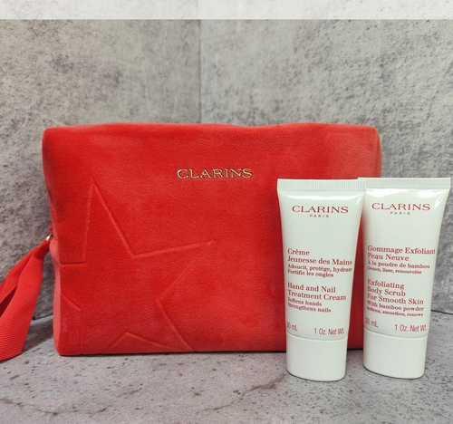 Набор Clarins в бархатной косметичке