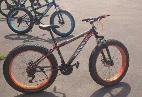 Новый чёрно-оранжевый велосипед