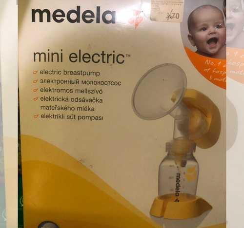 Молокоотсос medela электрический