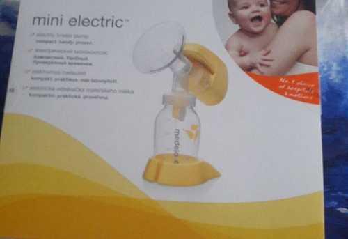 Молокоотсос medela mini электрический