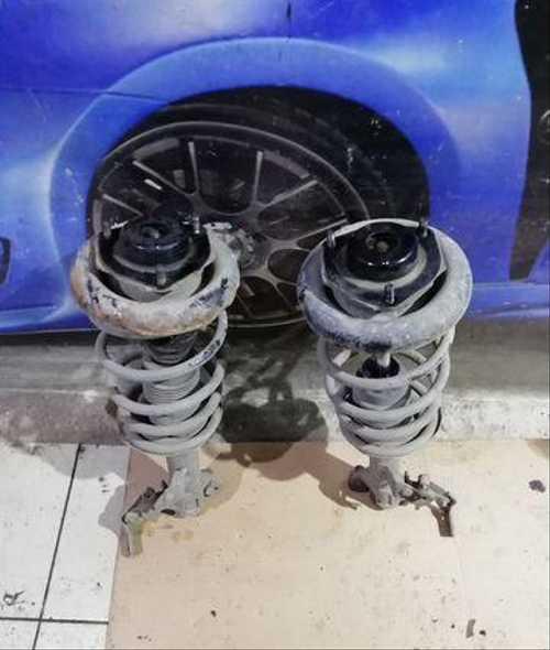 Стойки передние в сборе Nissan Primera P12