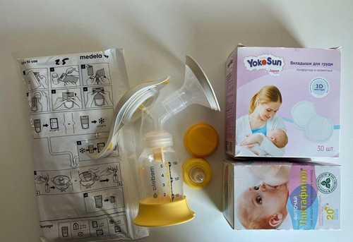 Молокоотсос, пакеты для грудного молока medela