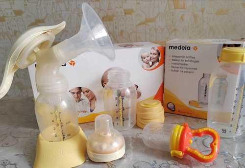 Молокоотсос medela ручной