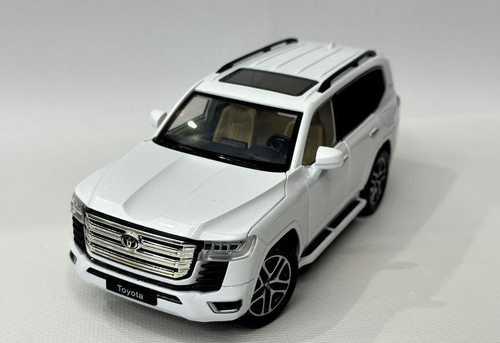 Инерционная машинка Toyota Land Cruiser 1:24