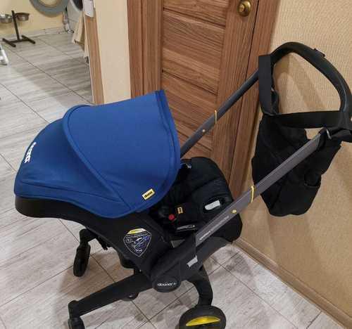 Коляска автокресло doona с базой isofix