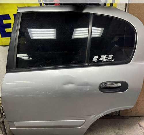 Дверь задняя левая almera n16