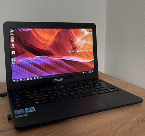 Ноутбук asus vivobook E200H