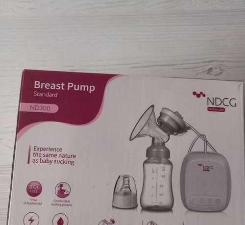 Электрический молокоотсос ndcg +накладки для груди