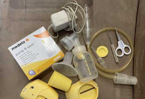Молокоотсос электрический Medela