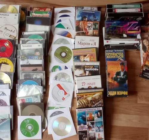CD и DVD диски, видео кассеты